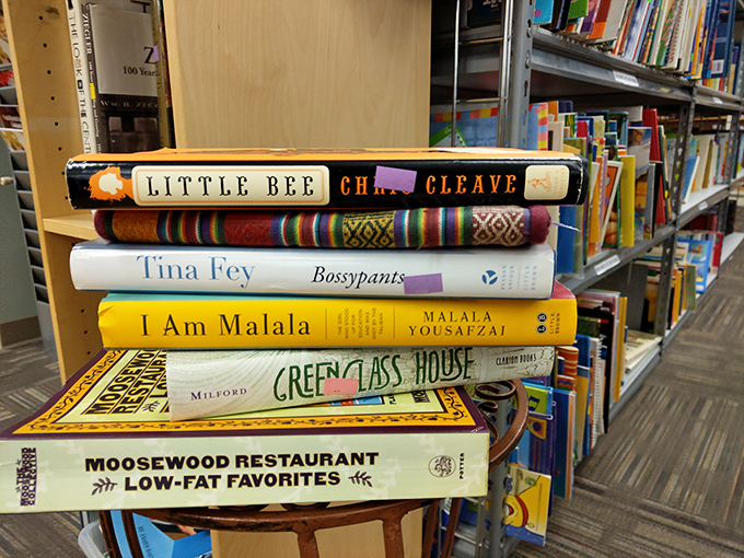 Literary treasures stacked like a time capsule of American culture &ndash; from Tina Fey's wit to Malala's wisdom, all waiting for new shelves.