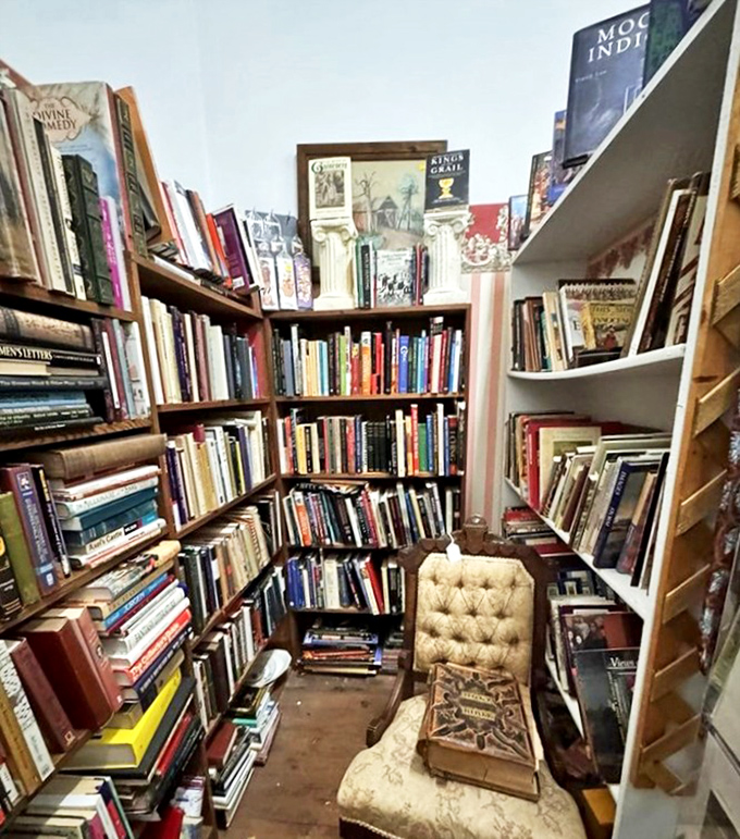 A bibliophile's dream corner complete with reading chair&mdash;because sometimes you need to sit down when you find that perfectly worn first edition.