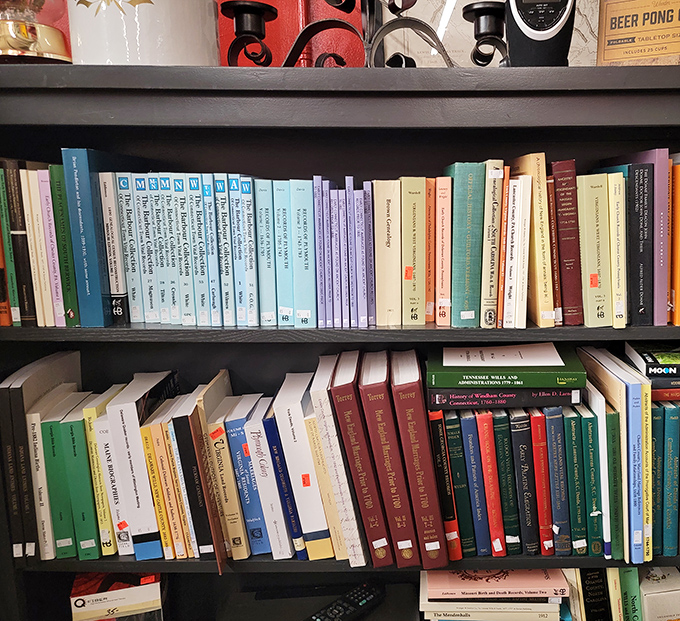 Books organized by color create an accidental rainbow of knowledge – proof that even in the digital age, paper and binding still hold their magic.