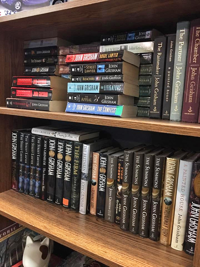 A John Grisham collector's dream come true! Mississippi's literary hero lines these shelves, waiting to deliver courtroom drama to your bedside table.