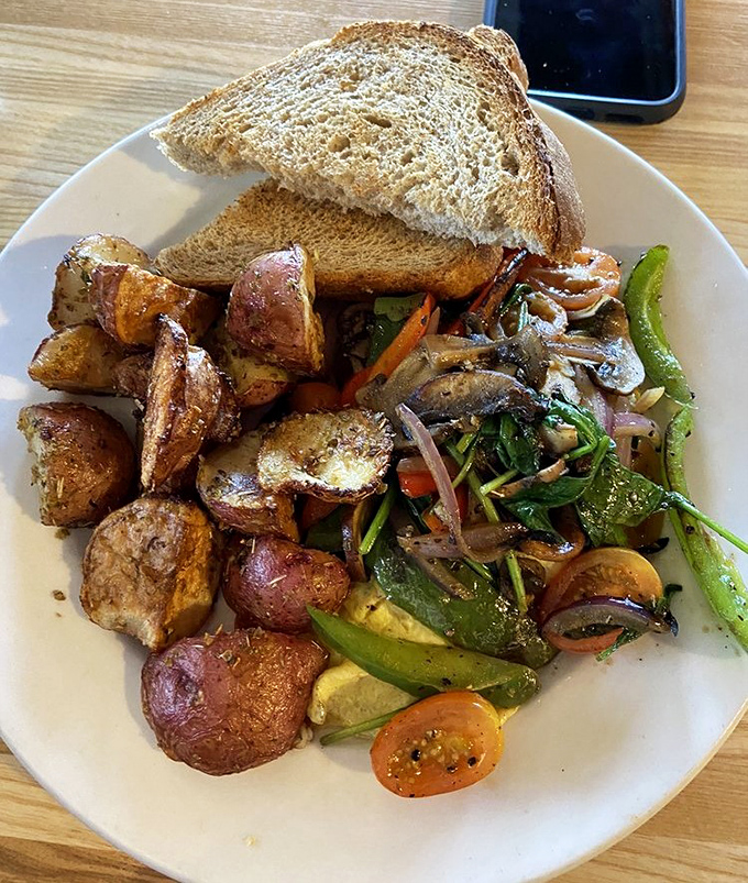 Roasted potatoes that crackle with flavor alongside saut&eacute;ed vegetables and toast &ndash; proof that simple ingredients can create extraordinary experiences.