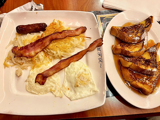 The breakfast of champions, or anyone who appreciates eggs cooked to perfection alongside crispy bacon and golden French toast.
