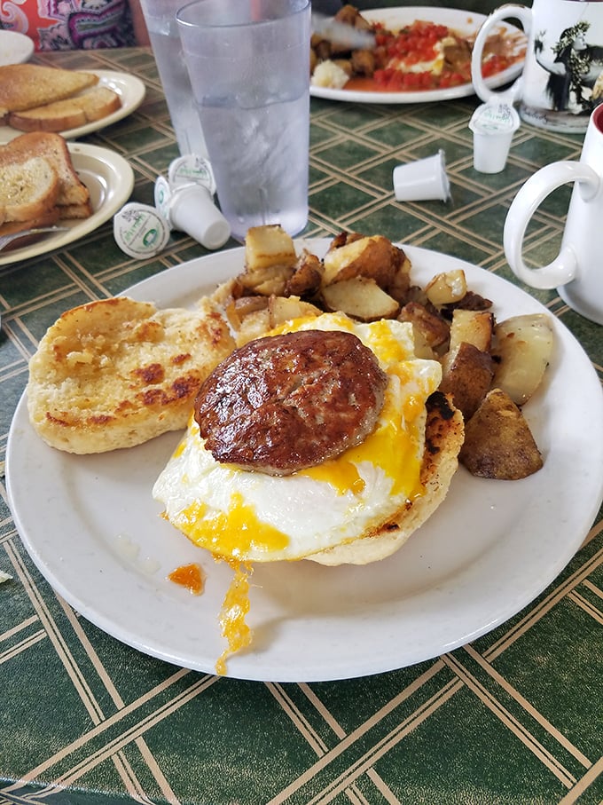 The breakfast sandwich that answers the eternal question: "Why choose between eggs, sausage, and hash browns when you can have them all?"