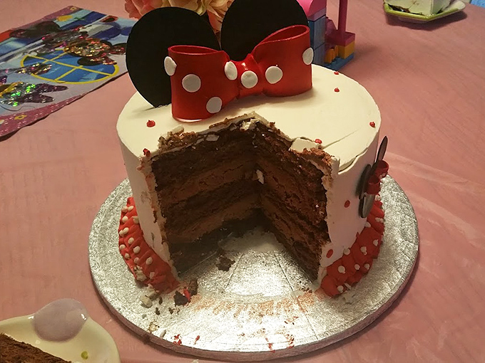 A Minnie Mouse cake that reveals layers of chocolate perfection inside&mdash;proof that character cakes can be both adorable and delicious.