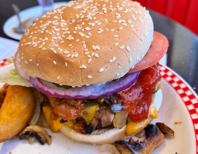 A burger that requires a game plan before the first bite. Those mushrooms and melted cheese aren't just toppings&mdash;they're a flavor committee.