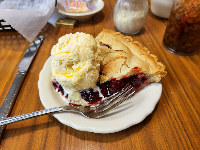 Berry pie &agrave; la mode &ndash; where warm fruit filling meets cold vanilla ice cream in a temperature tango that never disappoints.