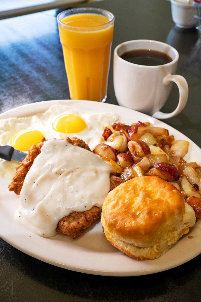 Country-fried steak with gravy, eggs, potatoes, and that signature biscuit&mdash;a breakfast plate that requires both commitment and stretchy pants.
