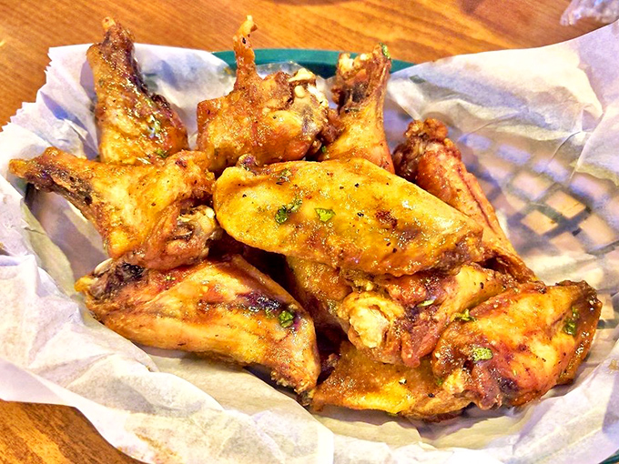 These chicken wings aren't just golden-fried, they're the kind that silence conversation at the table except for the occasional "mmm" and "pass those back."