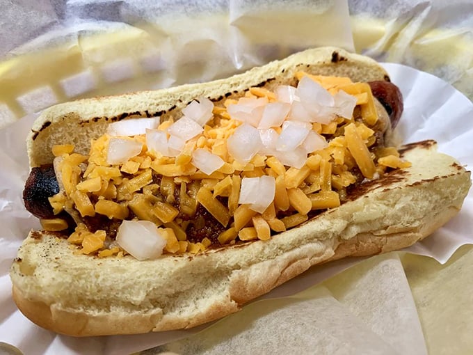 The coleslaw-topped dog brings a refreshing crunch to the party. It's like putting a Hawaiian shirt on your hot dog &ndash; unexpectedly perfect.