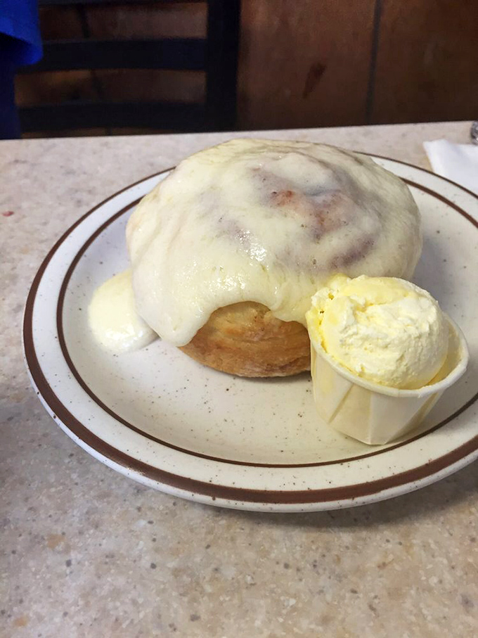 The cinnamon roll doesn't just come with butter&mdash;it arrives with a scoop of it, because Mom's Kitchen understands that moderation is sometimes overrated.