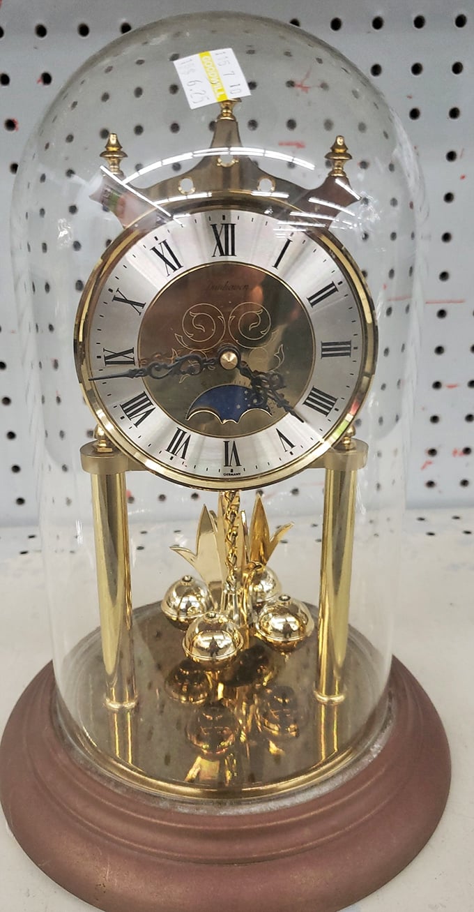 Time literally stands still on this elegant clock, waiting for a new home. Vintage elegance without the antique store markup.