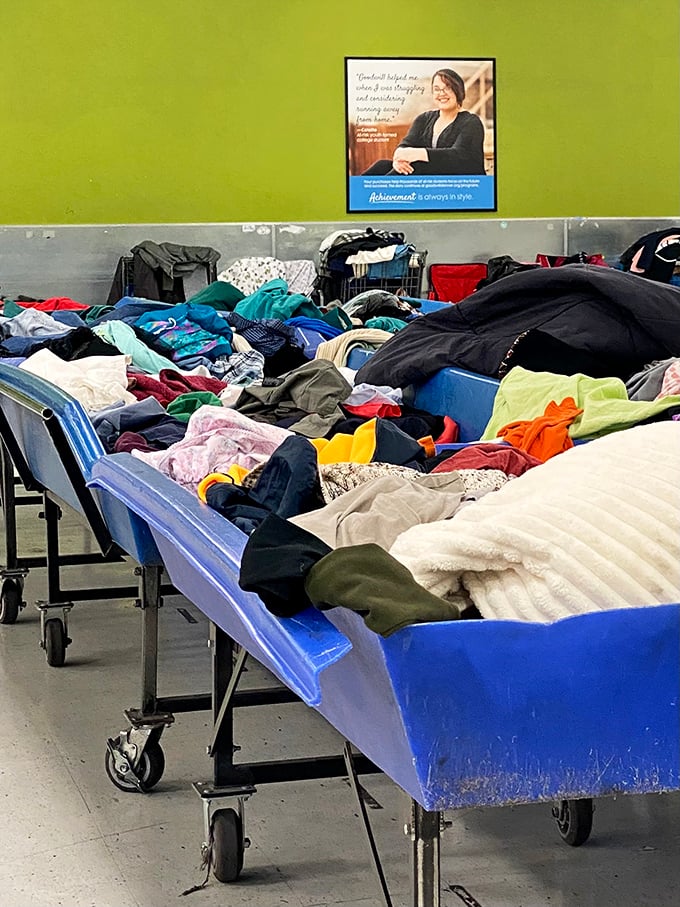 Each colorful layer tells a story. Somewhere in this textile mountain lurks someone's perfect sweater, waiting to be discovered.