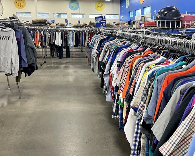 Men's shirts lined up like soldiers, a kaleidoscope of patterns and colors ready for inspection. That perfect Oxford button-down is hiding somewhere.