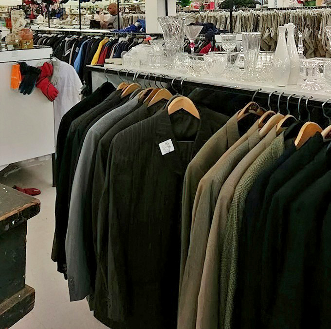 A sign pointing to more Value World locations. When one treasure cave isn't enough, Michigan offers a whole network of bargain bonanzas.