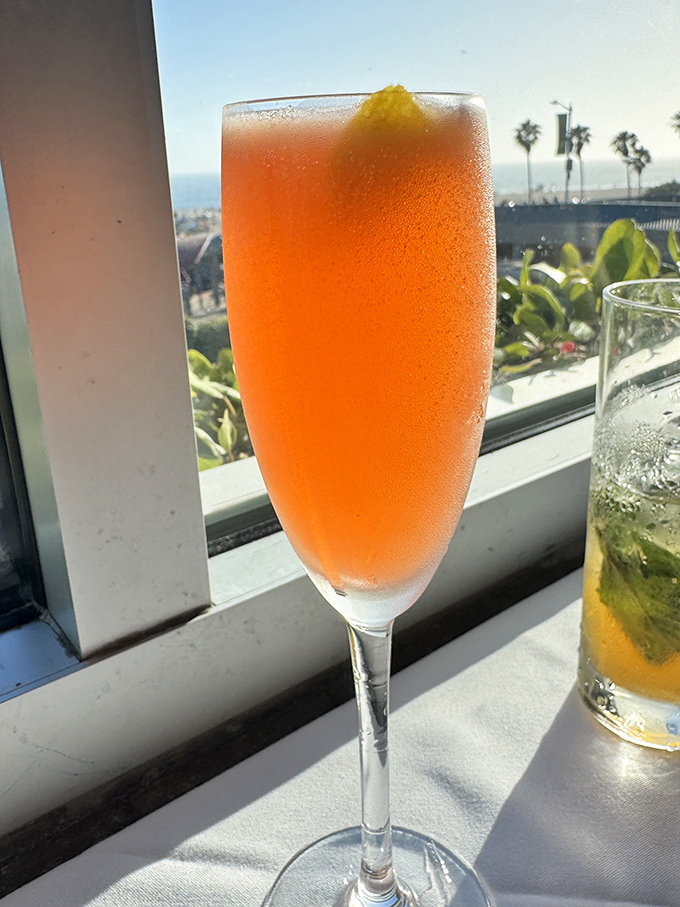 Sipping this sunset-colored cocktail with an ocean view feels like you've somehow hacked the California lifestyle code.