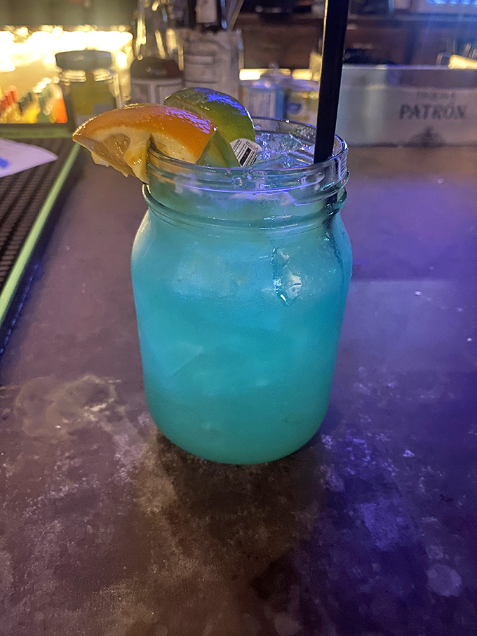 This electric blue cocktail in a mason jar isn't just a drink&mdash;it's a vacation in a glass, complete with citrus souvenirs.