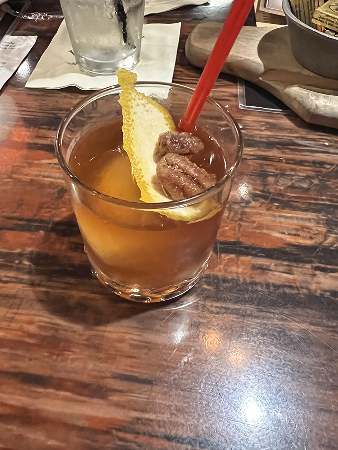 This isn't just a cocktail&mdash;it's liquid amber sunshine with personality. The candied garnish is the bow on this gift to your taste buds.