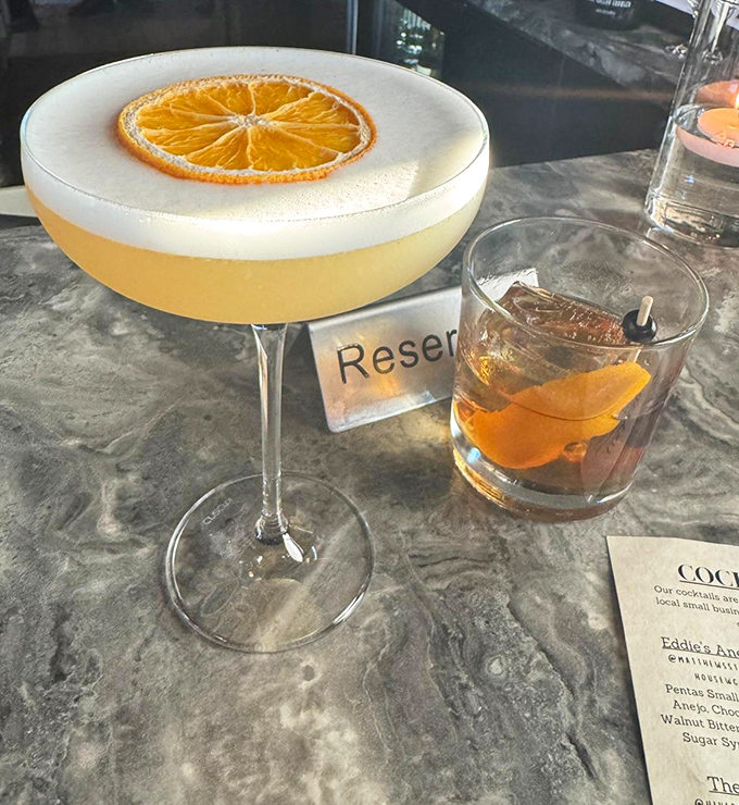 This isn't just a cocktail; it's liquid sunshine topped with foam and a perfectly placed orange slice&mdash;the kind that makes you forget you ever liked beer.
