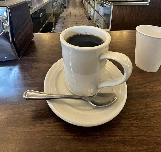 A simple cup of coffee in a classic white mug. In an age of frothy, complicated concoctions, there's something revolutionary about getting the basics right.