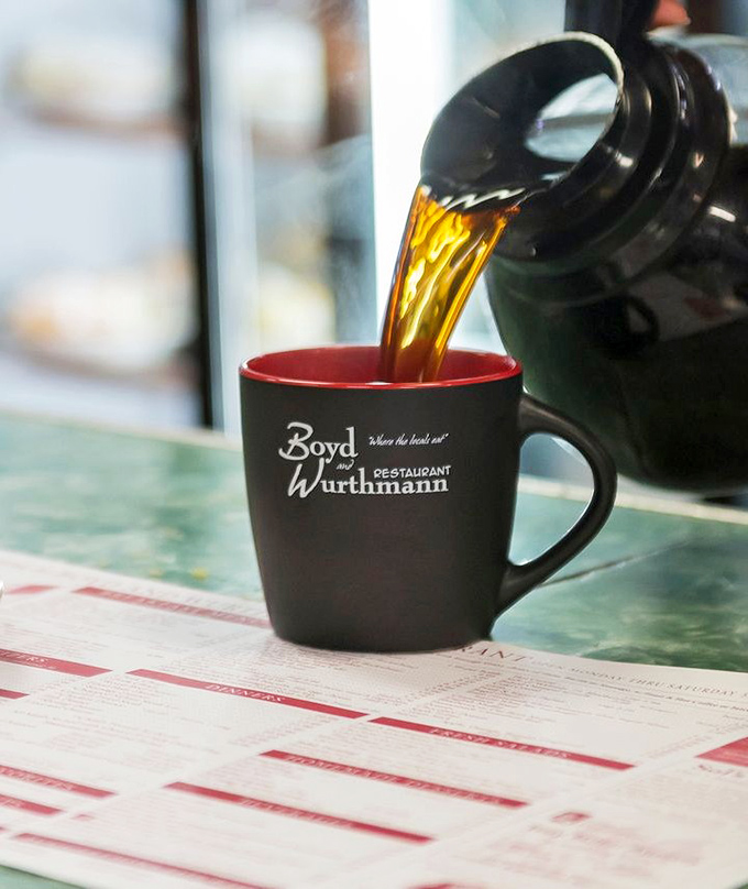 Coffee being poured into a mug that's seen thousands of refills. In Ohio's Amish Country, this cup isn't just caffeine&mdash;it's liquid conversation.