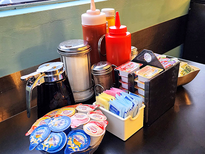 The condiment station—civilization's greatest achievement. Everything you need to customize your breakfast experience, neatly arranged and waiting.