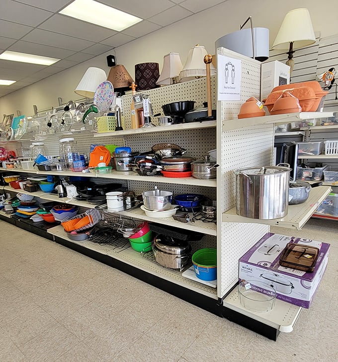 Kitchen implements awaiting their next culinary adventure. That orange Dutch oven could be the star of your next Sunday stew.
