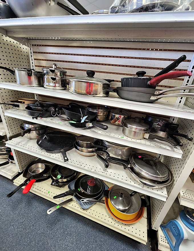 Cast iron, stainless steel, and vintage cookware that's survived decades of holiday feasts. That yellow pot definitely made someone's famous chili.