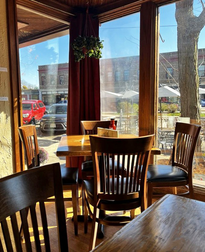 The corner window seat offers prime people-watching real estate while sunlight streams in, turning ordinary lunch into a moment of Madison magic.