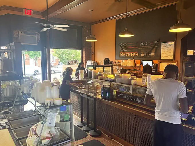 At the counter, where food dreams come true and regulars exchange friendly banter while waiting for their soul food fix.
