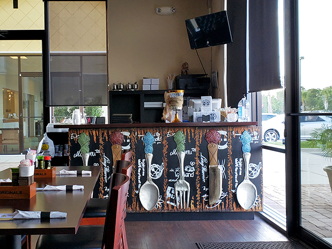 The counter where culinary dreams come true. That utensil artwork says, "We're serious about food, not about pretension."