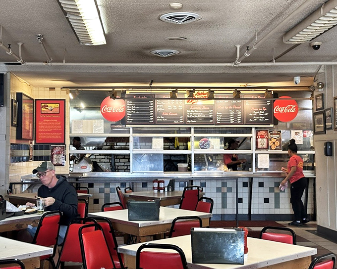 The counter where barbecue dreams come true, as skilled hands transform smoked meat into edible masterpieces before your eyes.