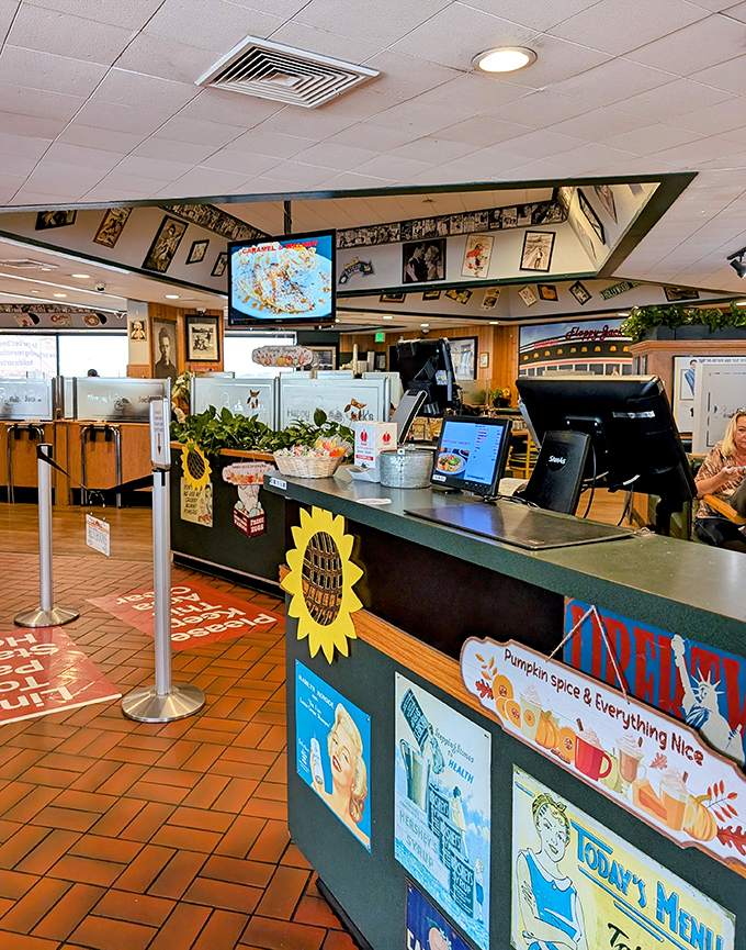 Welcome to command central! The host station at Flappy Jack's is decked out with colorful signs and vintage photos &ndash; breakfast nostalgia with a side of organization.