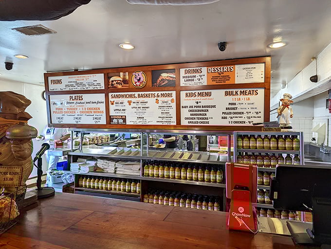 The ordering counter&mdash;where dreams come true and diet plans go to die. Those bottles of sauce aren't just condiments; they're liquid gold.