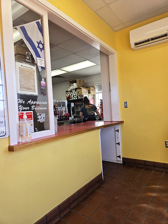 The ordering window's Israeli flag and "We Appreciate Your Business" sign tell a story of community connection beyond just serving food.