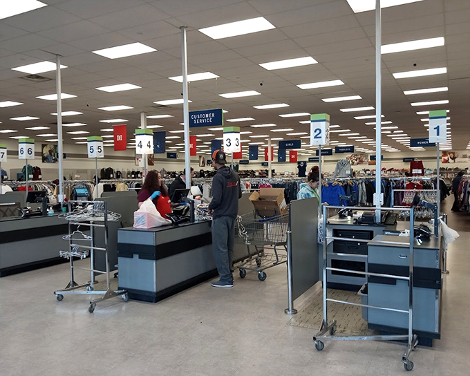 Numbered checkout stations stand ready for the parade of carts filled with discoveries that will soon transform houses into more personalized homes.