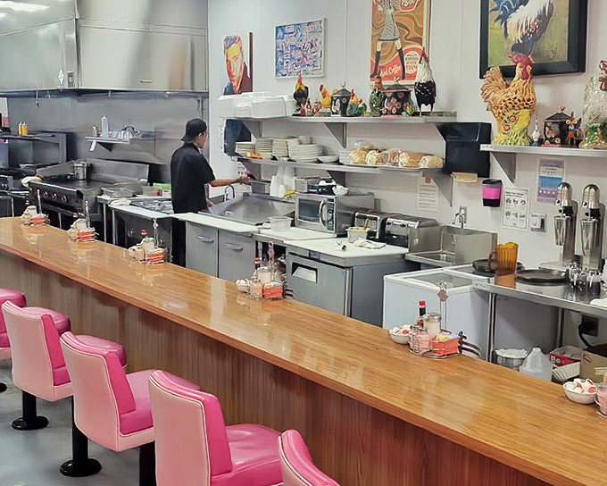 Where the magic happens &ndash; the counter seating offers front-row tickets to the breakfast ballet. Pink swivel chairs included at no extra charge.