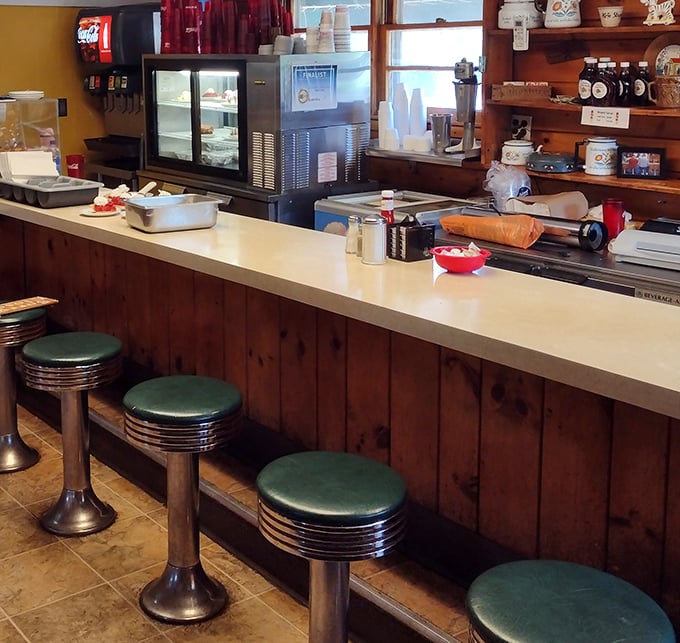 Counter seating where coffee refills appear like magic and the stools have witnessed countless local stories and traveling tales.