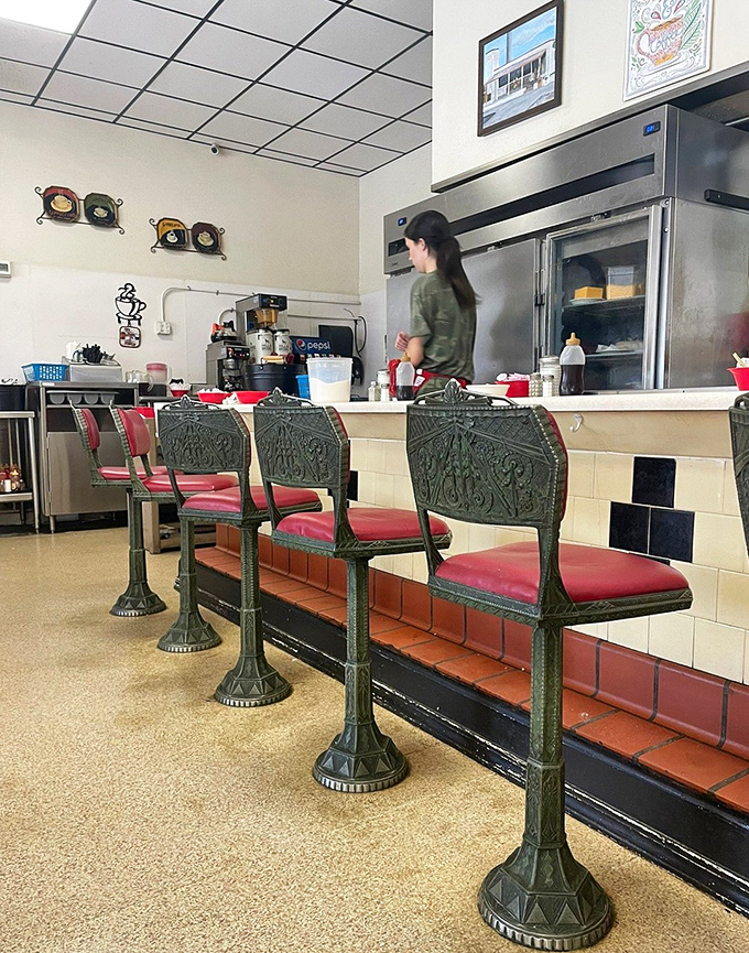 These vintage counter seats have supported generations of Pensacola residents, each with their own coffee cup stories to tell.