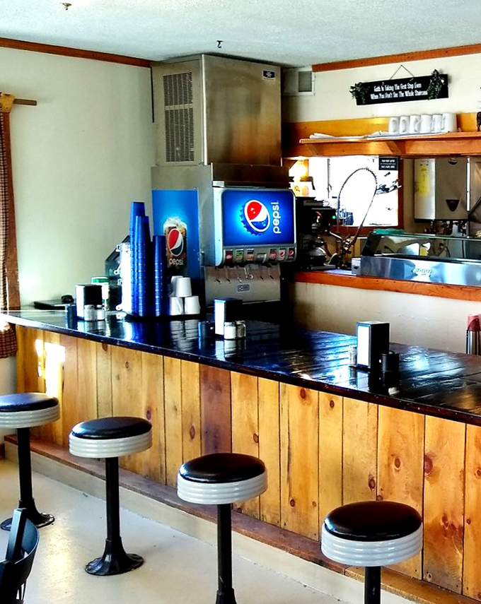 Counter seating that invites you to belly up for breakfast. The worn wood paneling tells stories of countless satisfied customers who came before you.