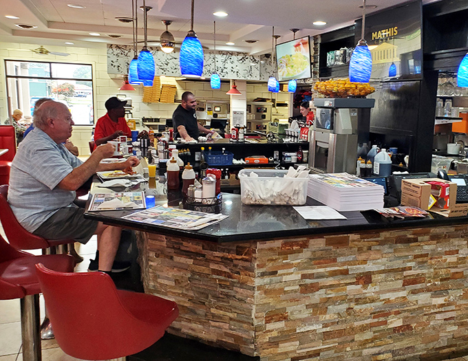 Counter dining: where solo eaters become temporary family and the short-order choreography becomes dinner theater worth the price of admission.