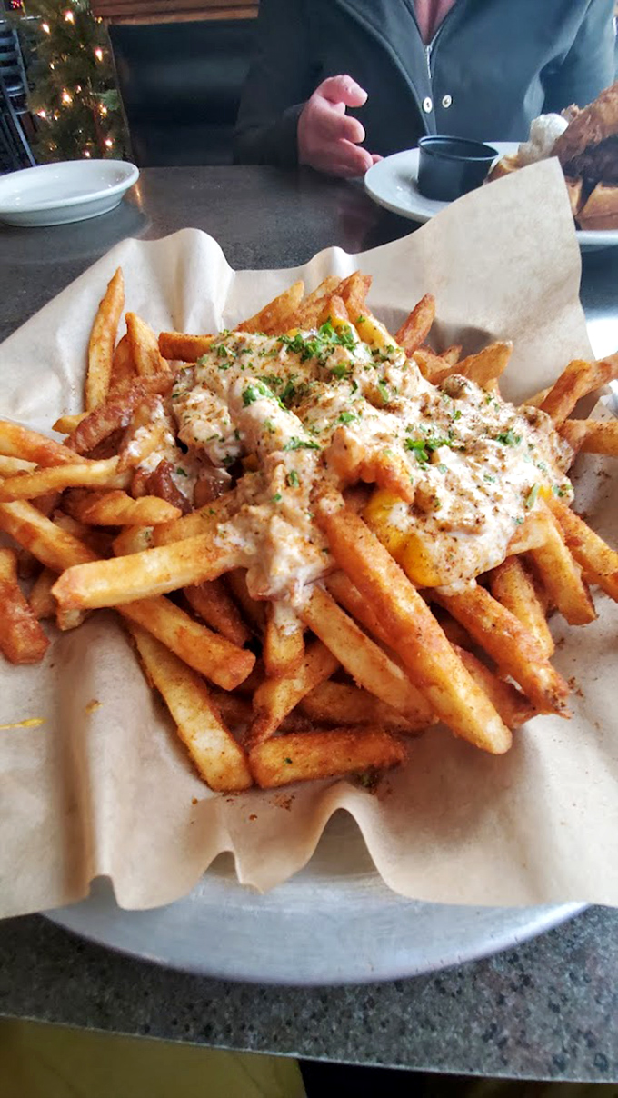 These aren't just fries&mdash;they're a canvas for creamy, herb-flecked deliciousness that transforms a side dish into the main event.