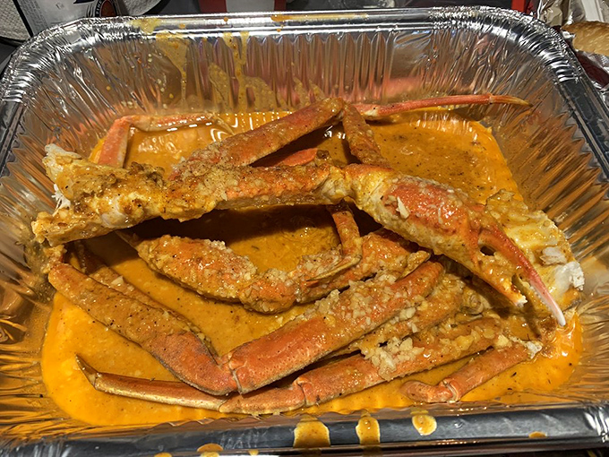 Snow crab legs and crawfish tails lounging in spiced butter like they're at a seafood spa. Tools provided, patience required, rewards guaranteed.