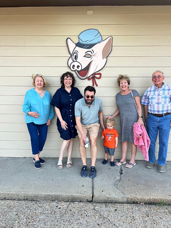 The winking pig mascot has witnessed generations of families making memories over plates of smoky perfection. If walls could talk...