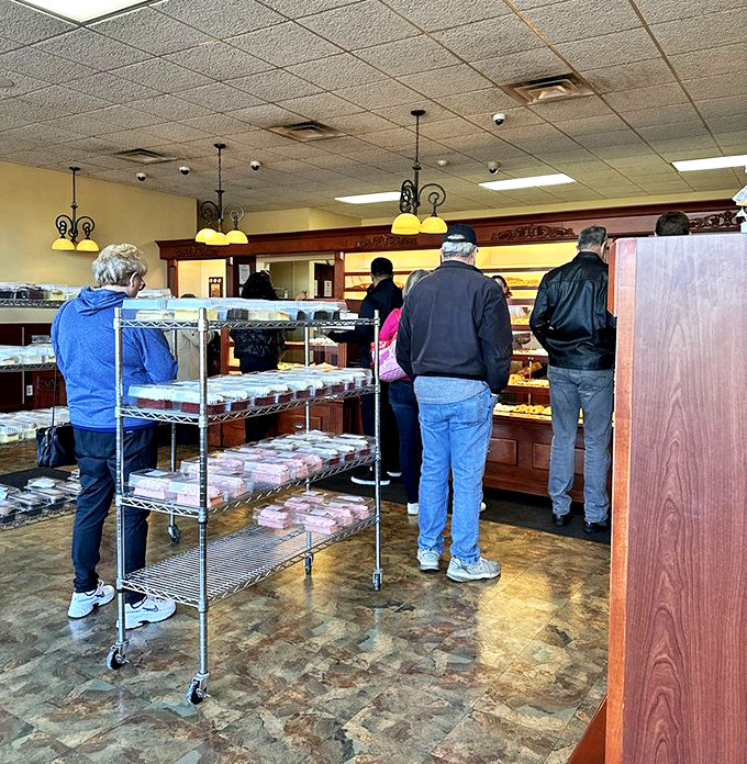 The weekend morning line at Resch's isn't just customers waiting – it's a community gathering of people making the smartest decision they'll make all day.