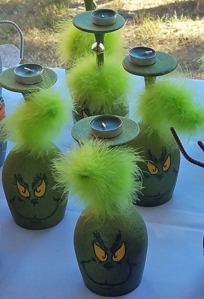 The Grinch has gone into the candle business! These fuzzy green holders would make even the most Christmas-averse heart grow three sizes.