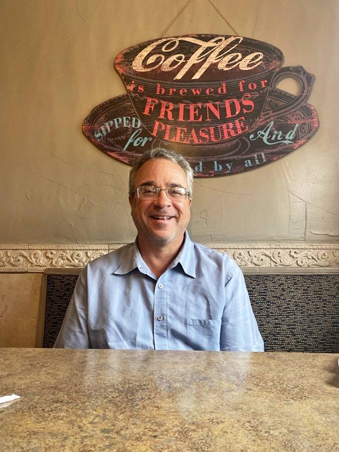 That welcoming smile behind the counter tells you everything about the hospitality waiting inside this establishment.
