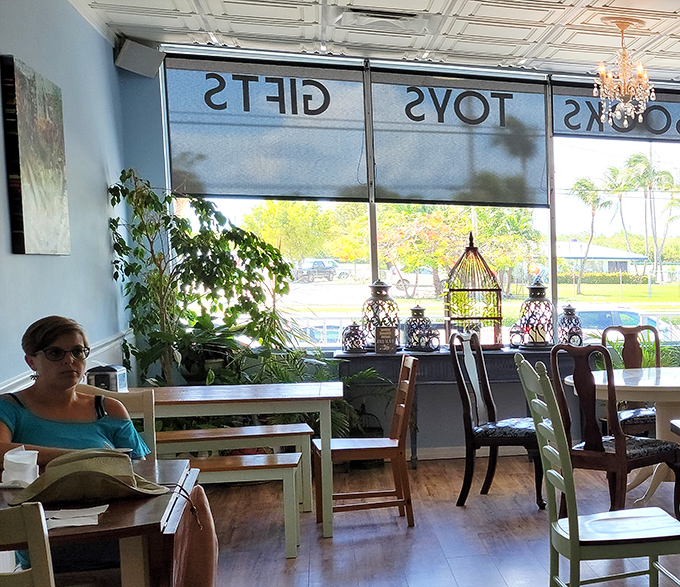 The dining area features a breathtaking tropical mural that pairs perfectly with dessert – visual calories don't count, right?