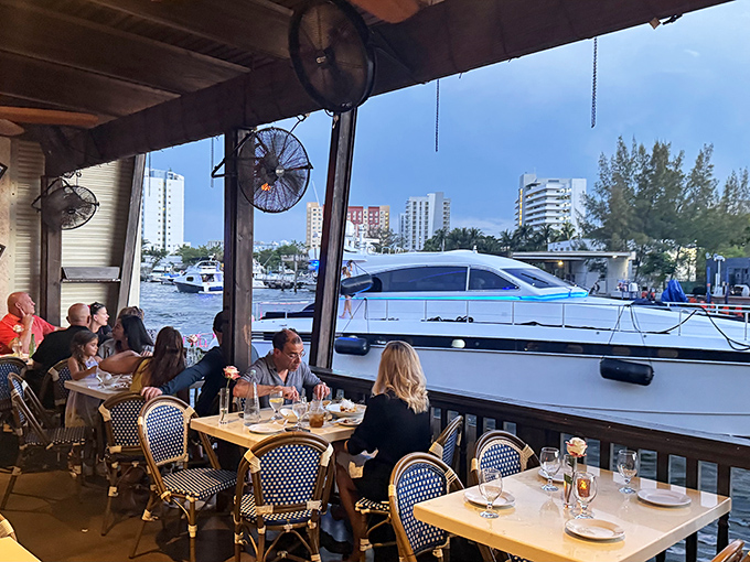 Front-row seats to Miami's aquatic highway&mdash;where yacht-watching becomes the perfect between-courses entertainment.