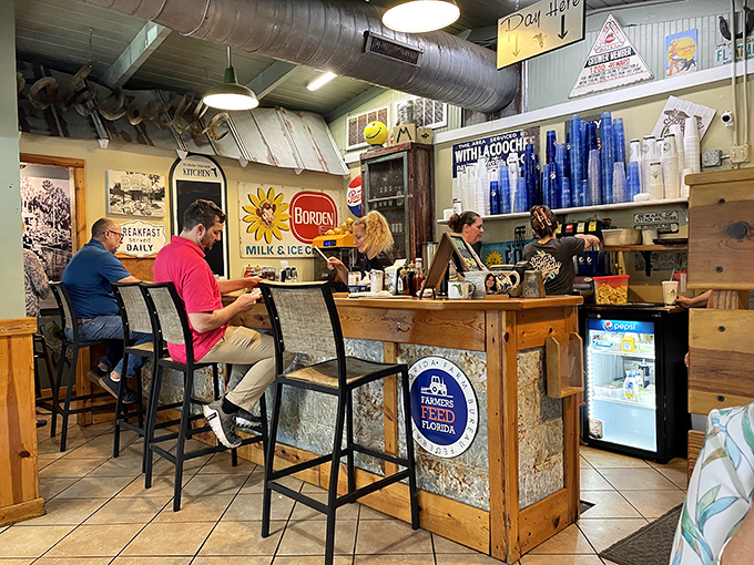 The counter where strangers become friends over coffee and conversations about whether grits should be savory or sweet (the answer is both).