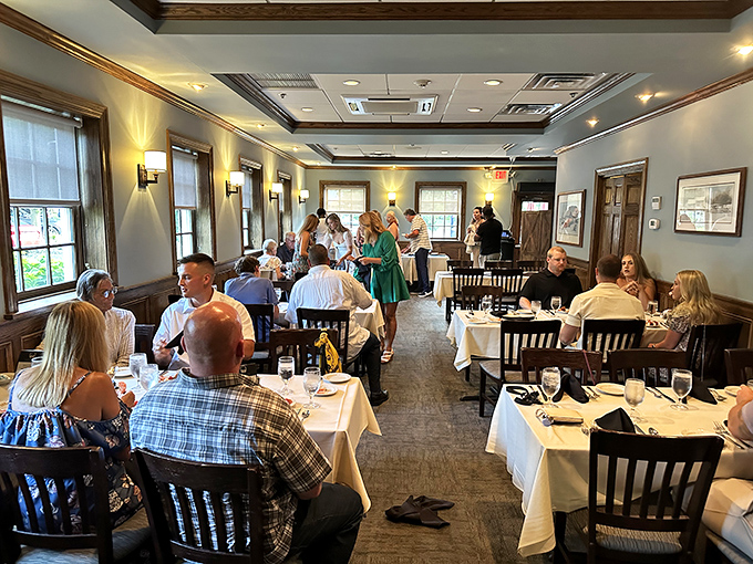 The dining room hums with the symphony of good times&mdash;clinking glasses, warm laughter, and the occasional "you have to try this" reaching across tables.